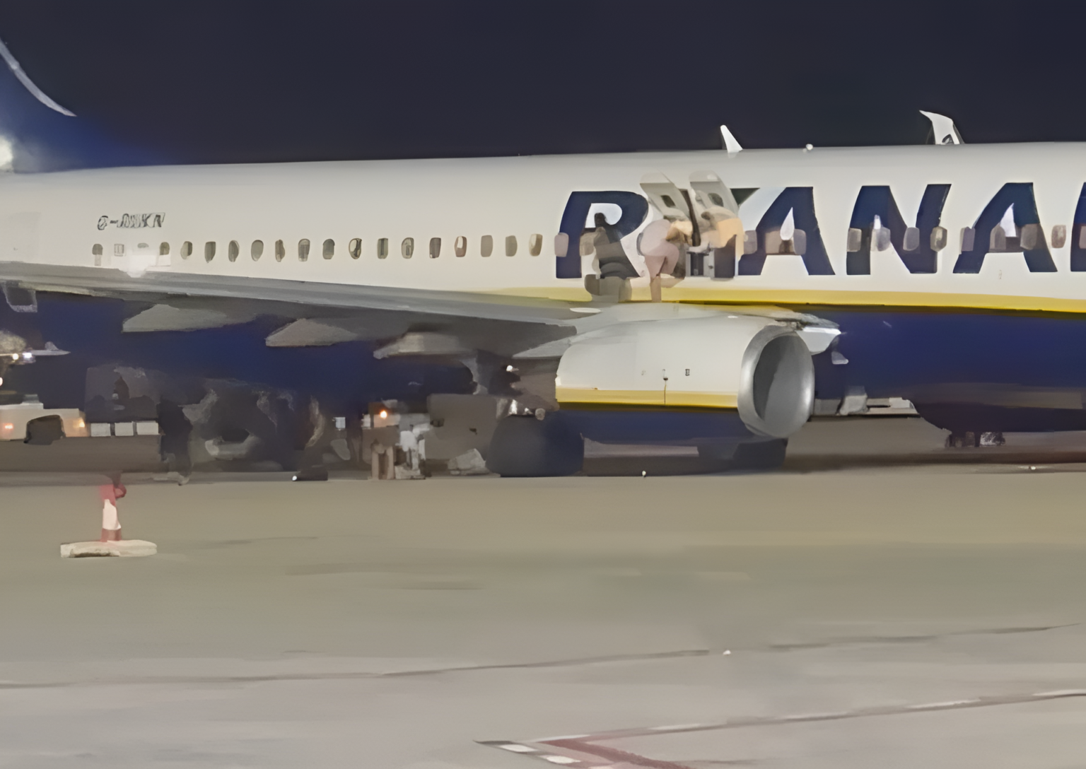 False Fire Alarm on Ryanair Flight Prompts Evacuation, Injuring 18 ...